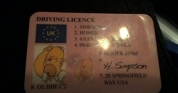 Driver Hands Cop Homer Simpson License