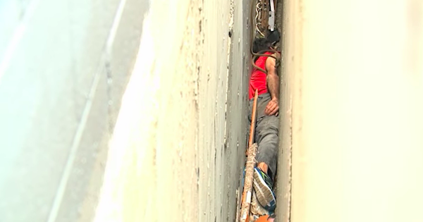 Guy Gets Stuck Between 2 Walls Trying To Retrieve Baseball