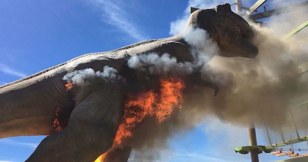T-Rex Goes Up In Flames At An Amusement Park
