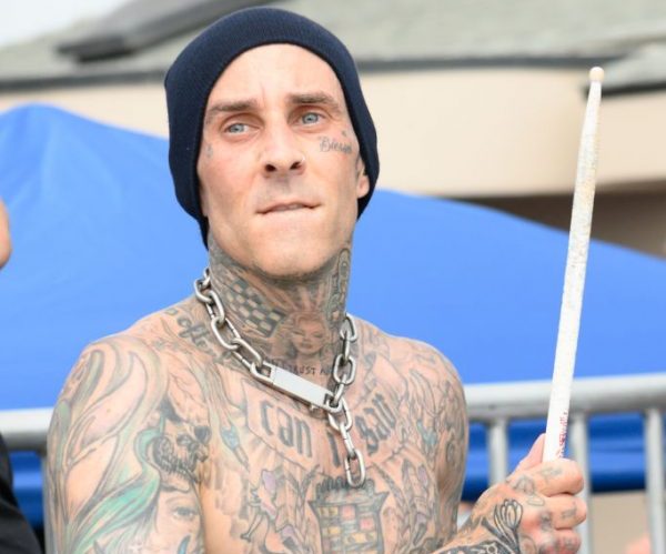 Travis Barker Reveals Skull-Shaped Tooth Gem on Instagram (We Get It ...