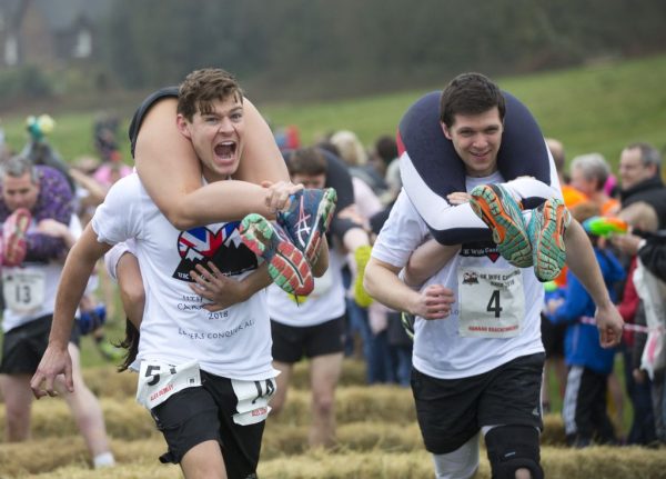 Wife-Carrying Contest Is Latest Way to Punish Married Men
