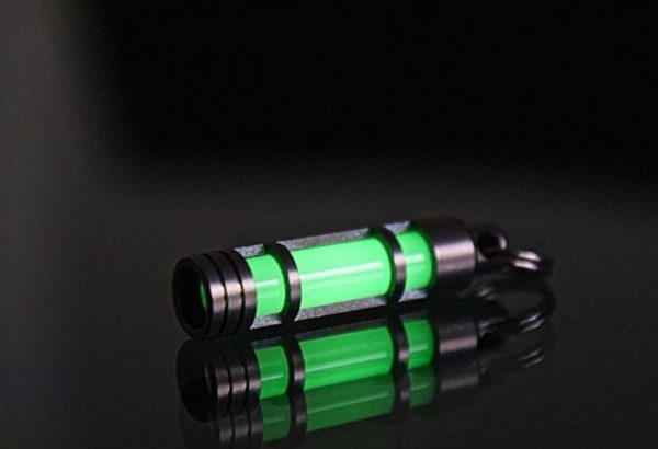 This TEC-T3 Titanium Embrite Glow Fob is Perfect for Late Night Partiers