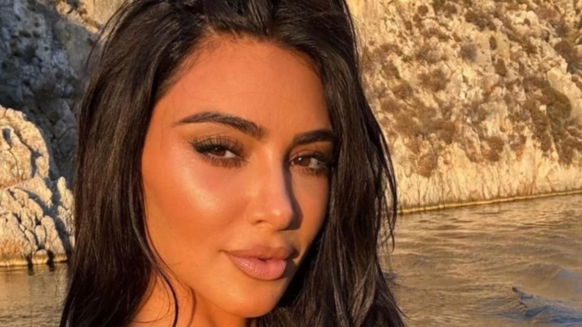 Kim Kardashian Appears in the Woods Wearing a Ski Mask & Bold Beachy ...