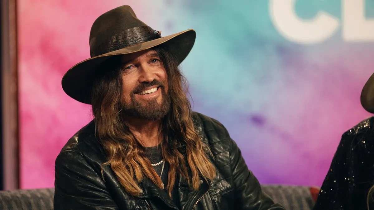 Elizabeth Hurley & Billy Ray Cyrus Cuddle in New Photos - Mandatory