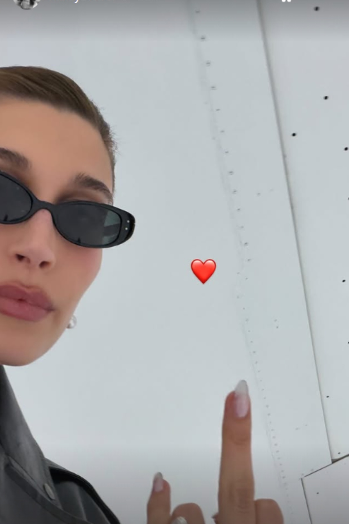 Hailey Bieber Shows Middle Finger In New Photo - Mandatory