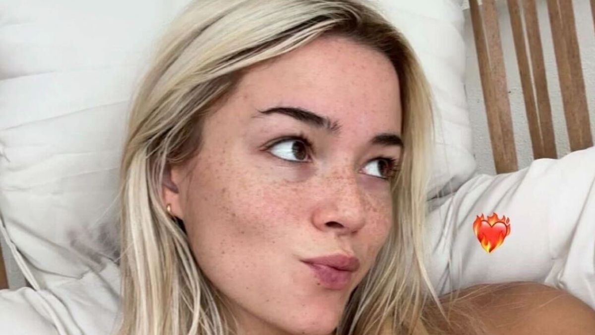 Livvy Dunne Poses in Bikini in Wild Poolside Photo with Dog - Mandatory