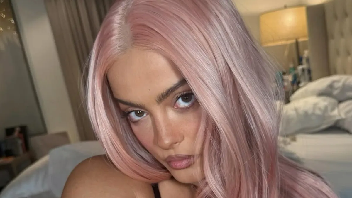 Bebe Rexha’s Lace Bra Peeks Out From High-Slit Dress - Mandatory