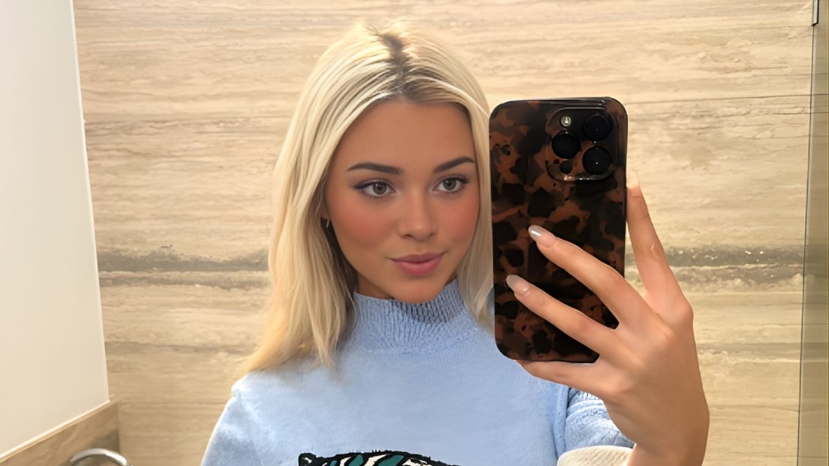 Livvy Dunne's Super Tiny Miniskirt & Sheer Tights Bring Festive Flair ...