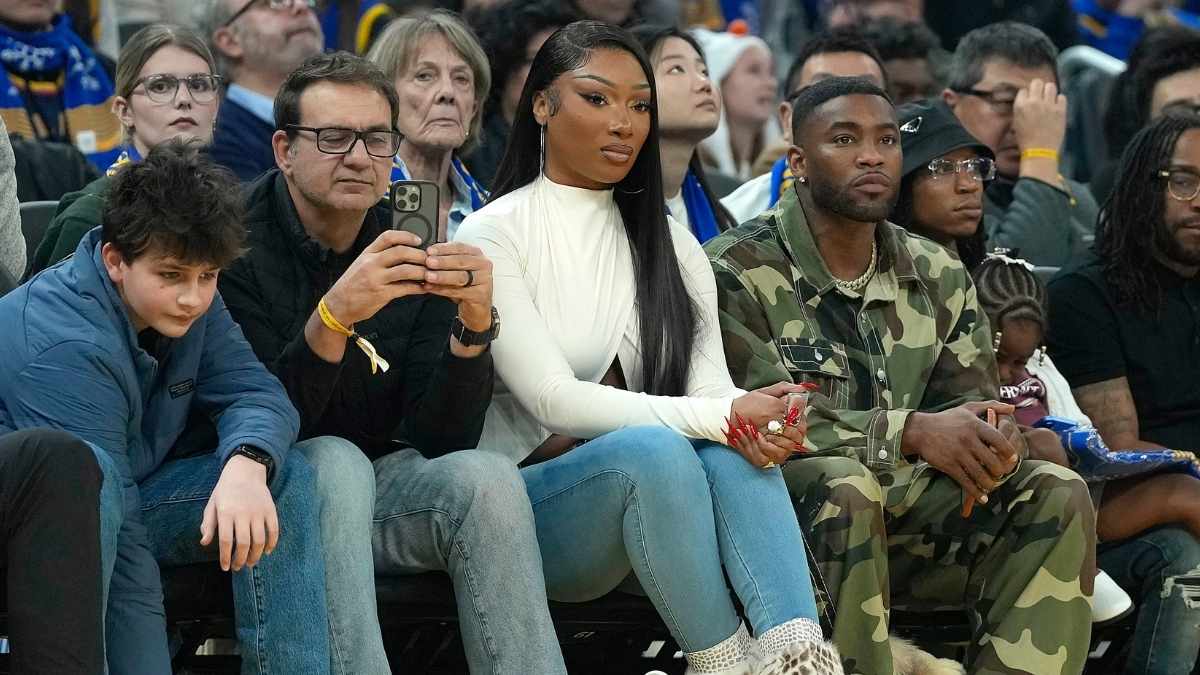 Megan Thee Stallion Flaunts Toned Abs in High-Slit Top - Mandatory