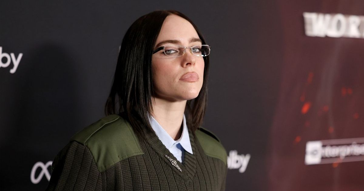 Billie Eilish Lying Down in Bold Top Will Make You Look Twice - Mandatory