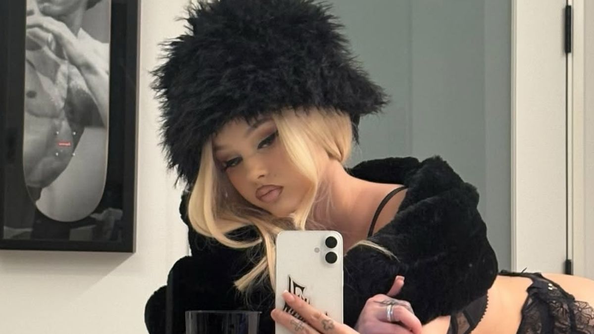 Alabama Barker Pairs Daring Leather Dress With Lacy Stockings - Mandatory