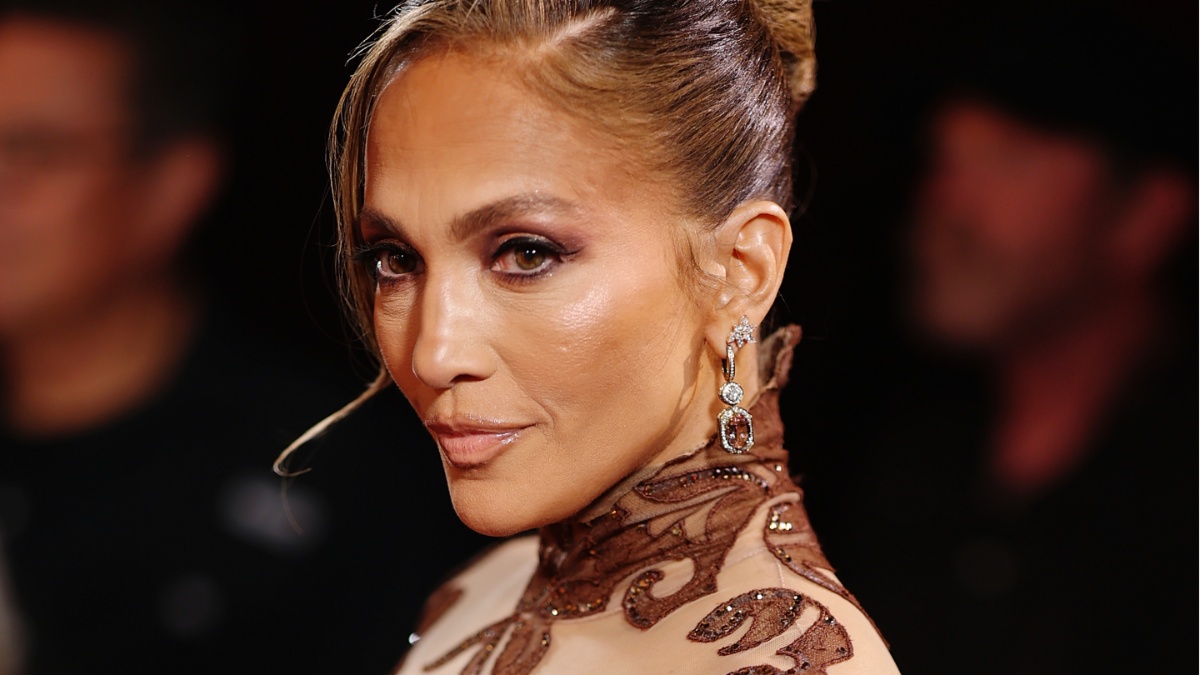 Jennifer Lopez's Sheer Gown Exposes Her Toned Abs - Mandatory