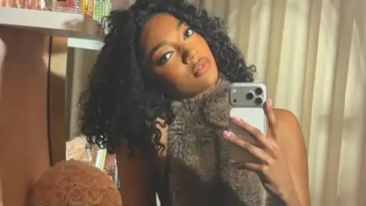 Angel Reese Sitting in Mini-Dress Will Take Your Breath Away - Mandatory