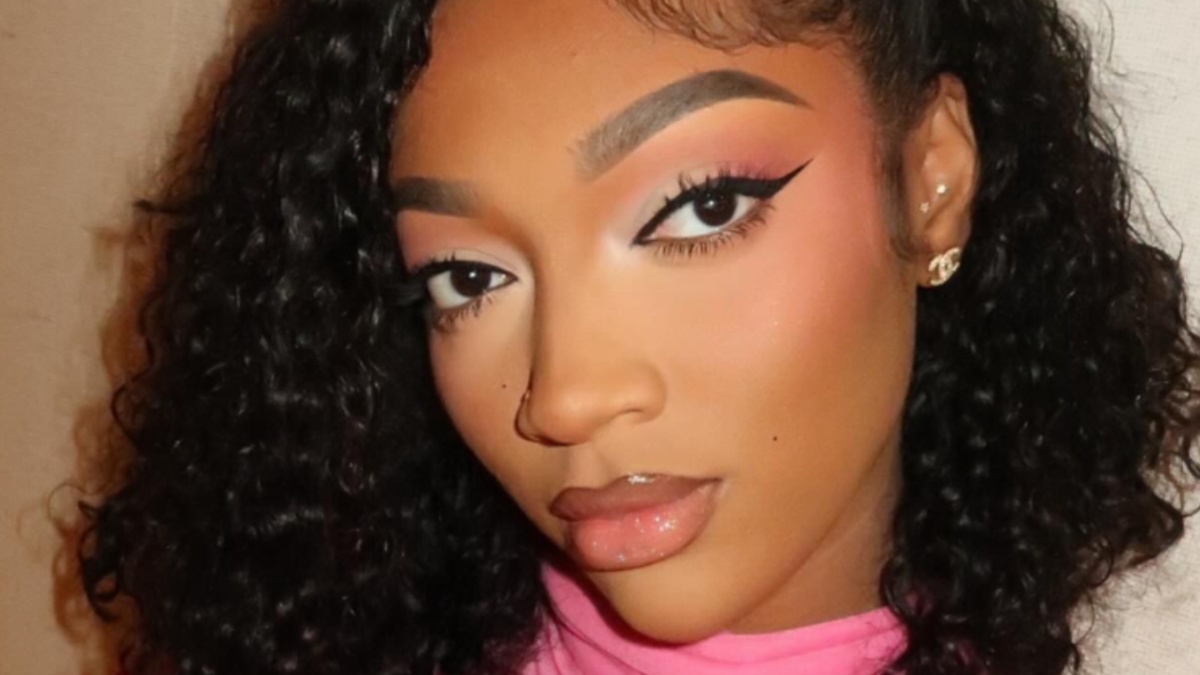 Angel Reese Sitting in Mini-Skirt Will Make You Look Twice - Mandatory