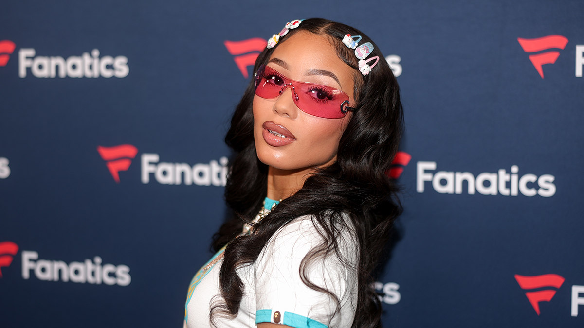 Coi Leray Poses in Yellow Mini-Dress in Viral Photo - Mandatory