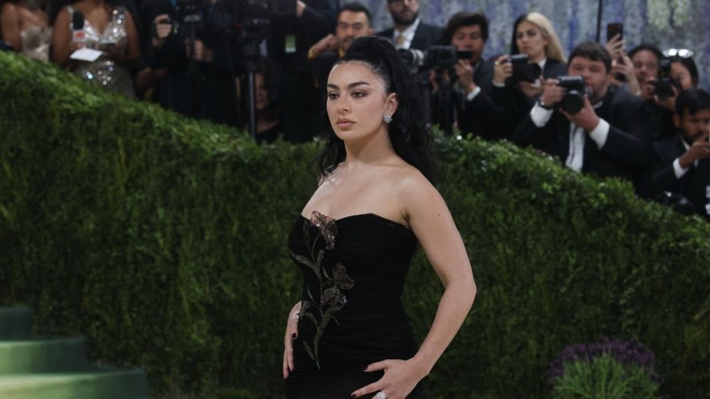 Charli XCX Gets Cheeky as She Nearly Spills Out of Stringy Bikini Top ...
