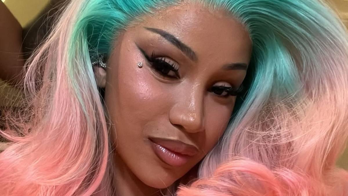 Cardi B Twirling in Cleavage-Baring Dress Has Fans Glued to Their ...