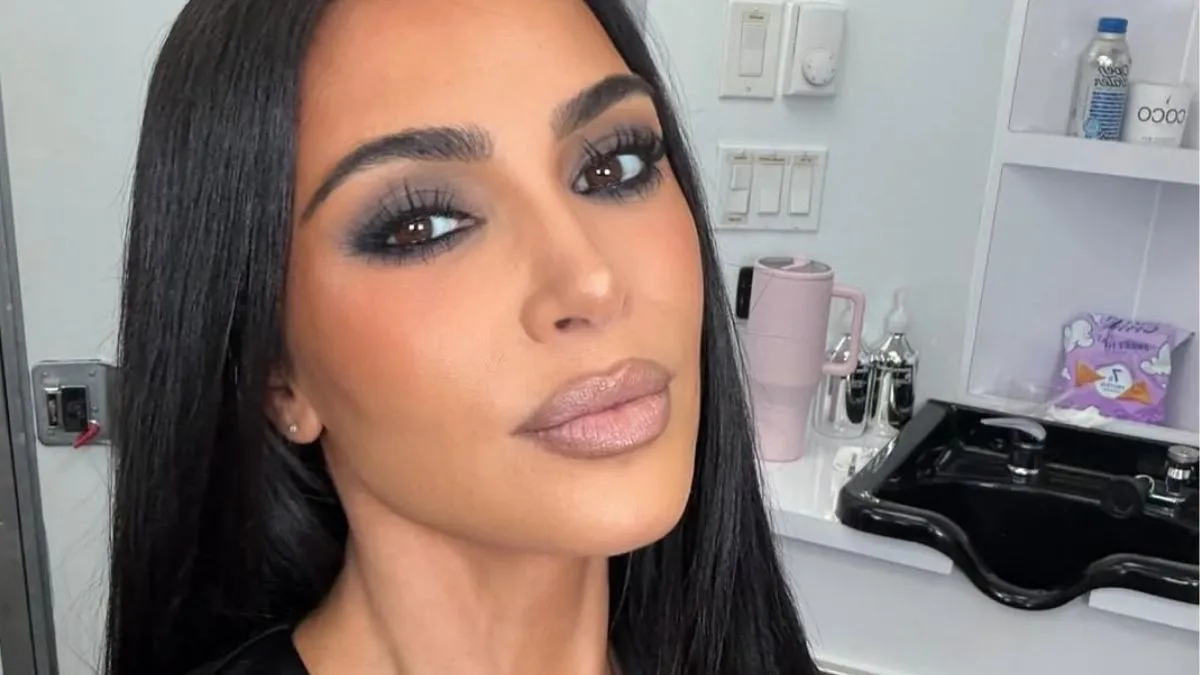 Kim Kardashian Leaves Her Coat Buttons Undone in Bold New Photos ...