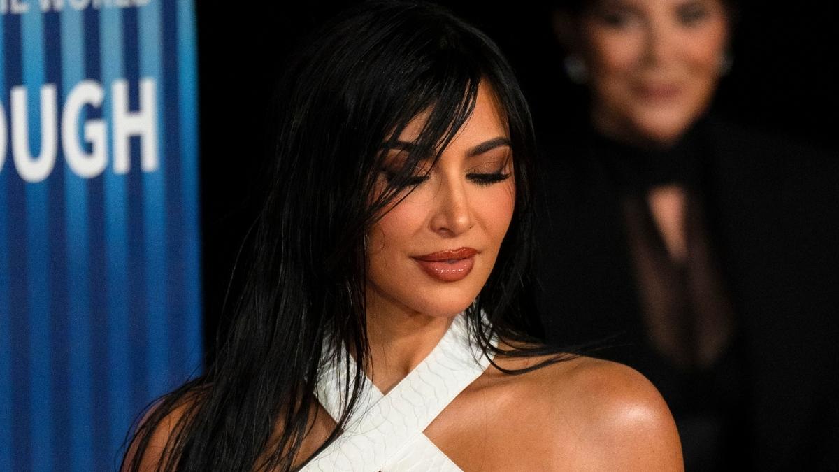 Kim Kardashian's Boldly Unzipped Jacket Slips Off One Shoulder - Mandatory
