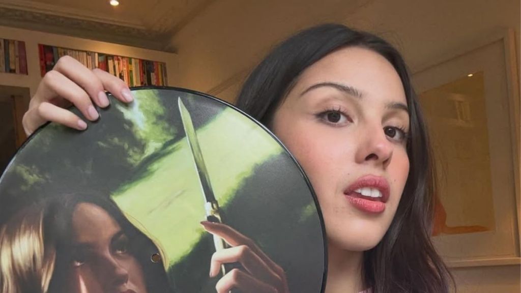 Olivia Rodrigo Leaves Miu Miu Micro Minidress Boldly Unbuttoned - Mandatory