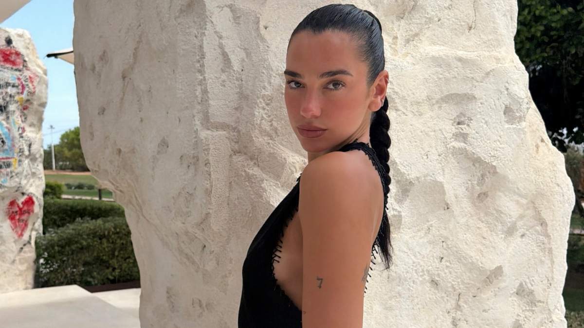 Dua Lipa Goes Braless Under An Open Jacket In A Seriously Daring Look